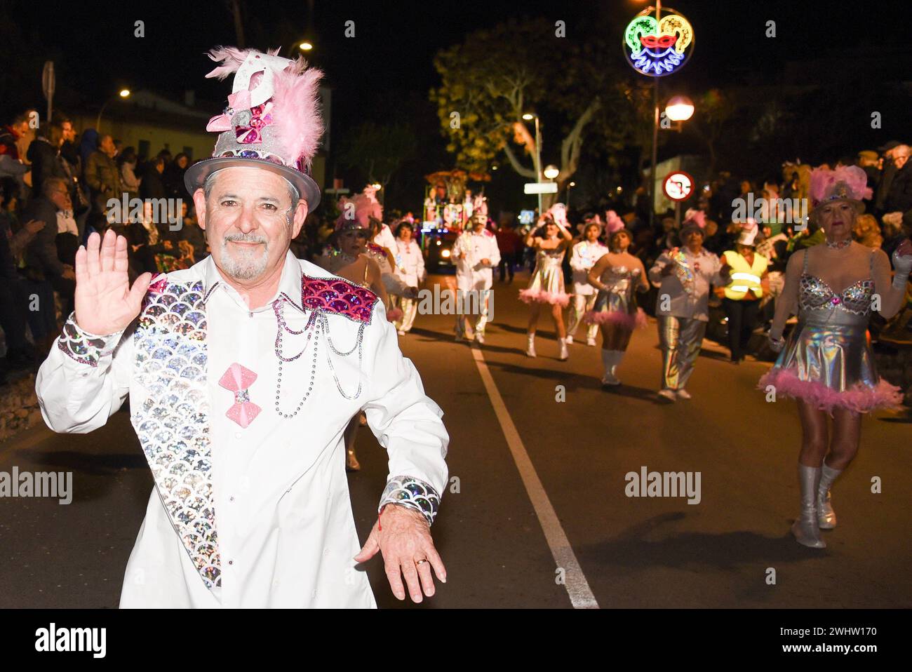 Cunit, Spain. 10th Feb, 2024. A man in costume dances during the 2024 ...