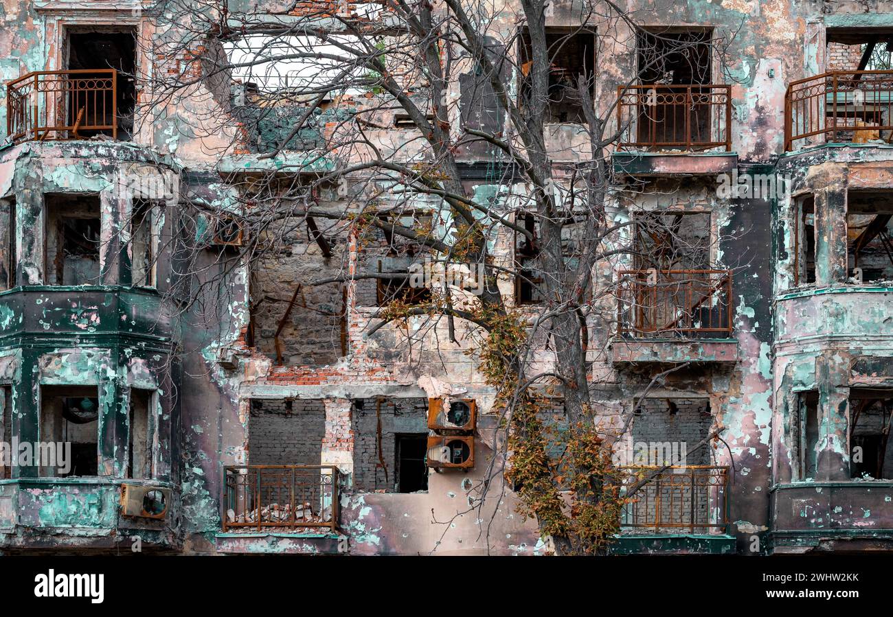 Destroyed and burned houses in the city Russia Ukraine war Stock Photo ...