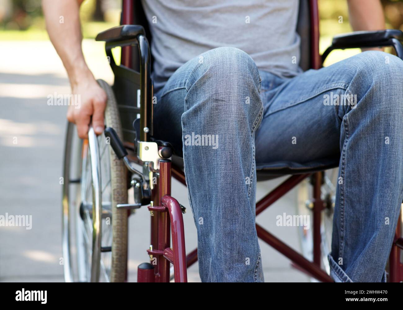 Man in wheel chair barrier hi-res stock photography and images - Alamy