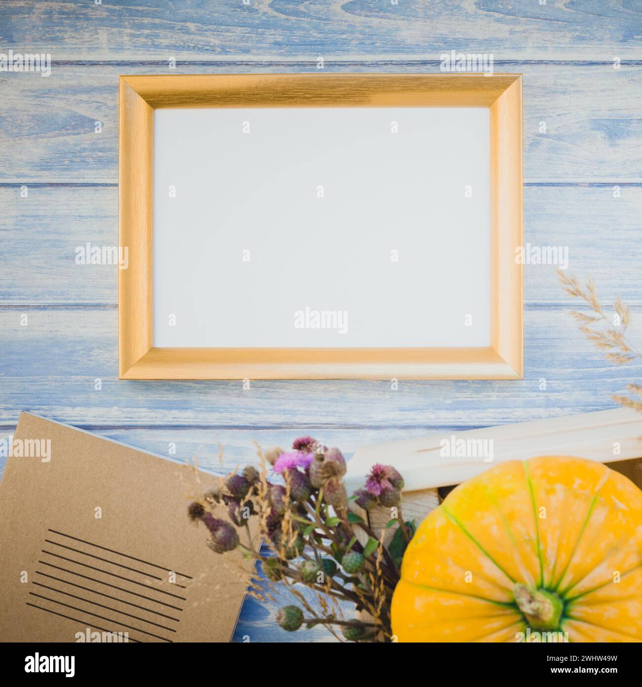 Golden frame mock up with autumn pumpkins Stock Photo - Alamy