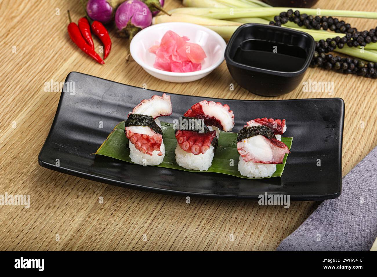 Japanese cuisine - sushi with octopus served ginger Stock Photo - Alamy