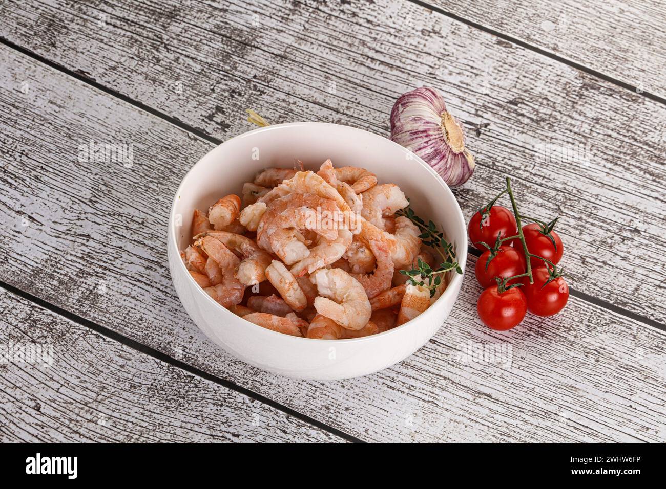 Raw peeled prawn in the bowl for cook Stock Photo - Alamy