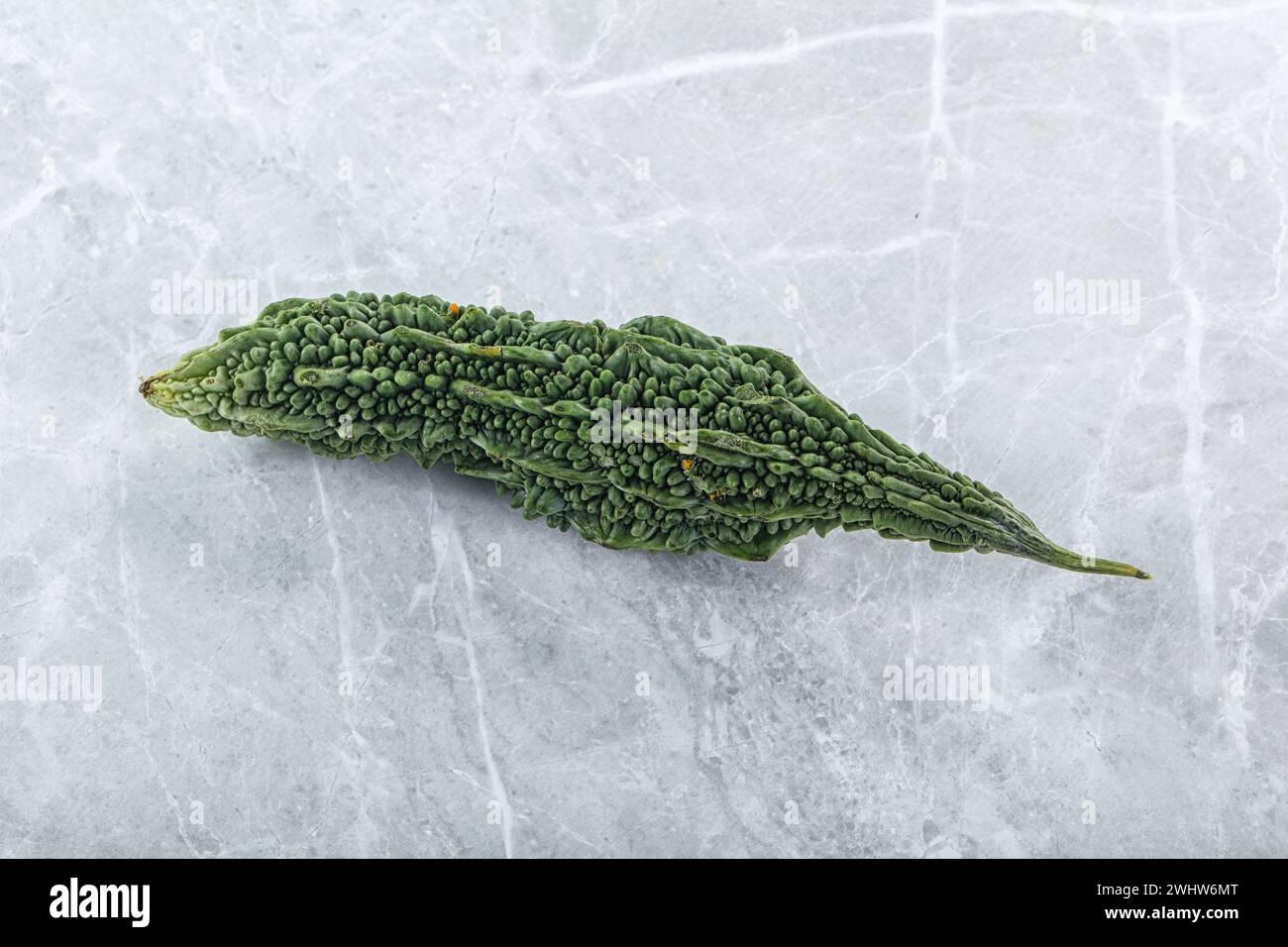 Tropical green organic vegetable - bitter melon Stock Photo - Alamy