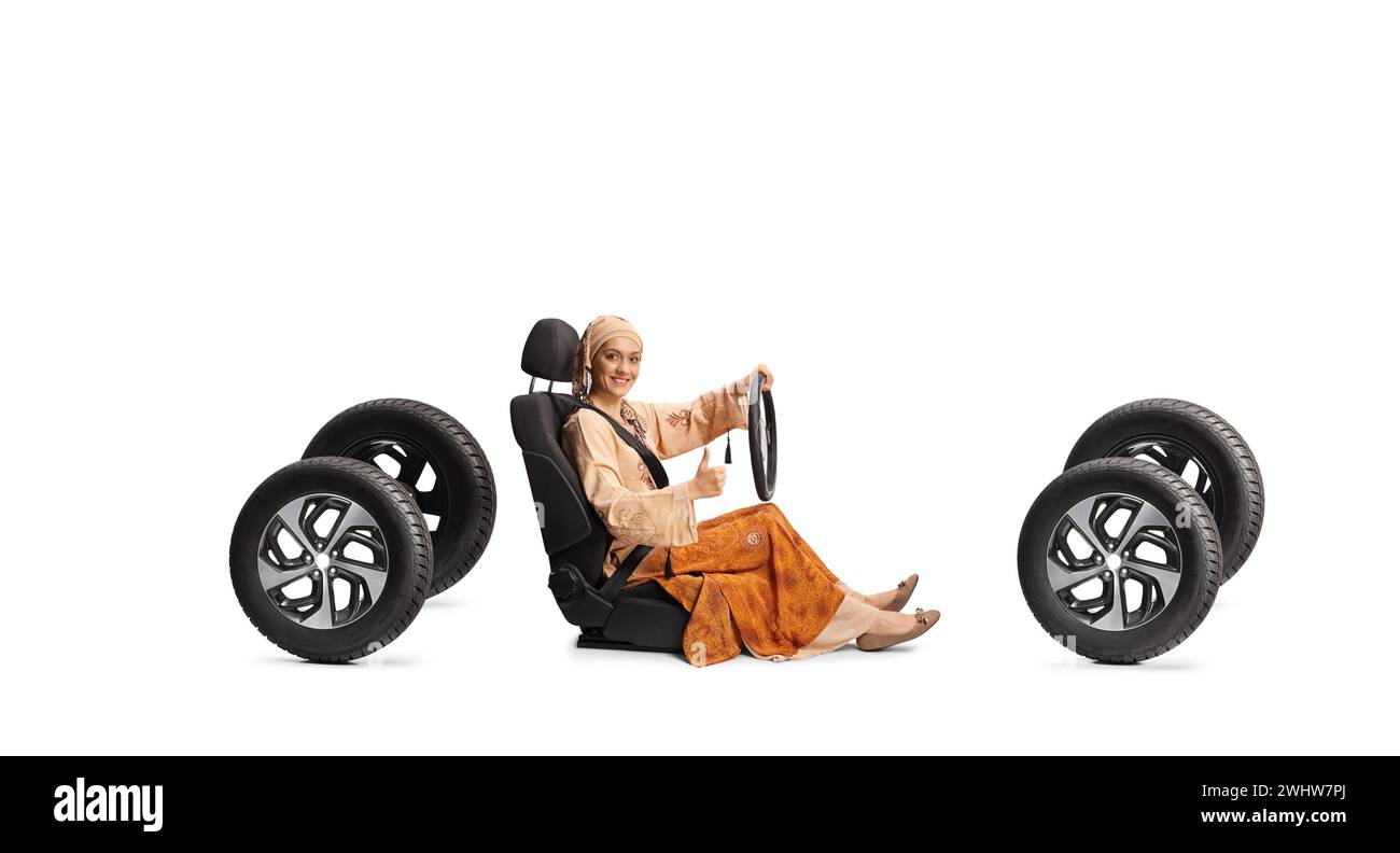 Young woman car wheel Cut Out Stock Images & Pictures - Alamy