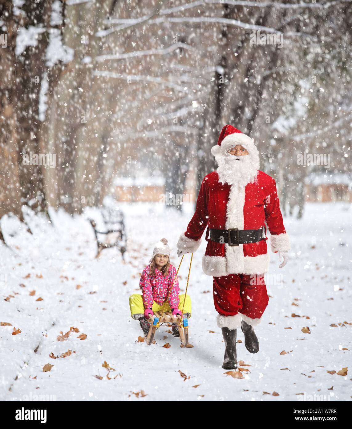 Santa pulling full sleigh hi-res stock photography and images - Alamy