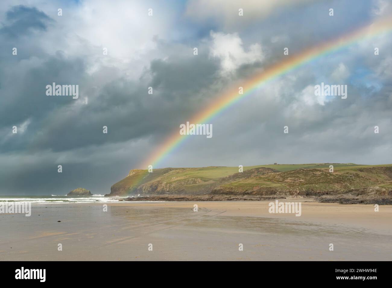 Rainbow striking land at Pentire point in Cornwall as seen from ...