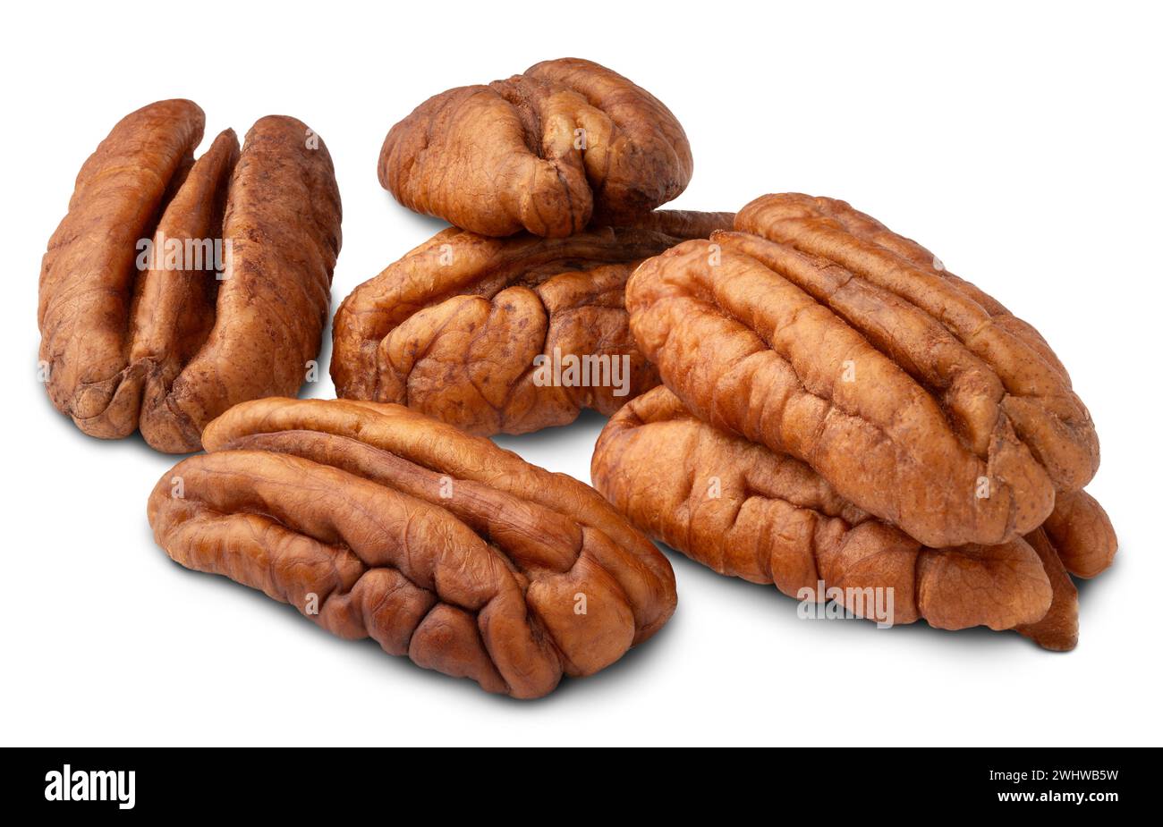 Pecan nuts group isolated on white background Stock Photo - Alamy