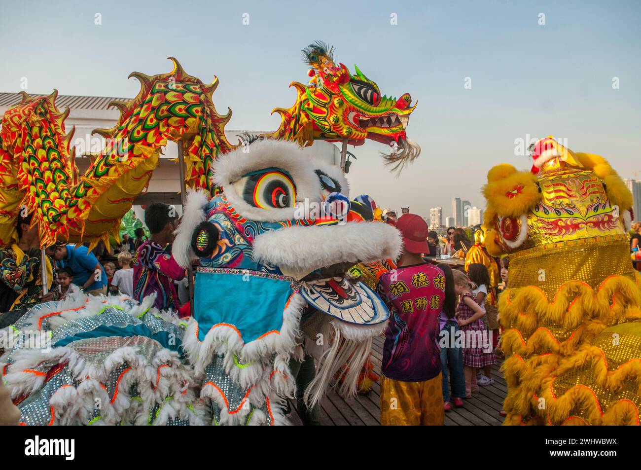 Dragon dancing & lion dancing simultaneously at a skybar for Chinese ...
