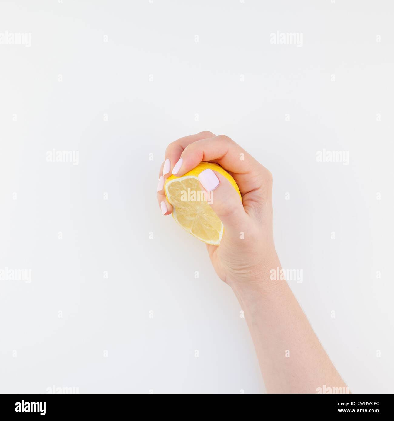 Lemon hand press hi-res stock photography and images - Alamy