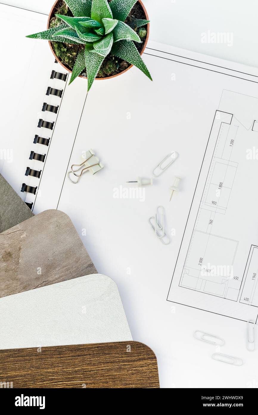 Interior designer table workplace with house plan Stock Photo - Alamy