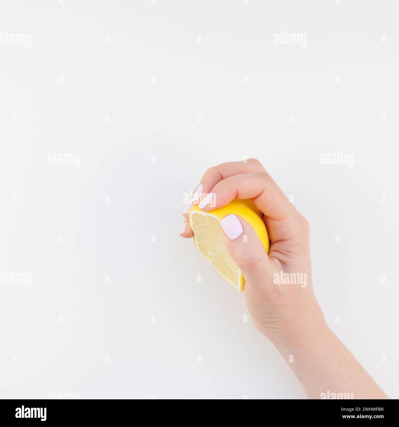 Woman squeeze lemon hand hi-res stock photography and images - Alamy