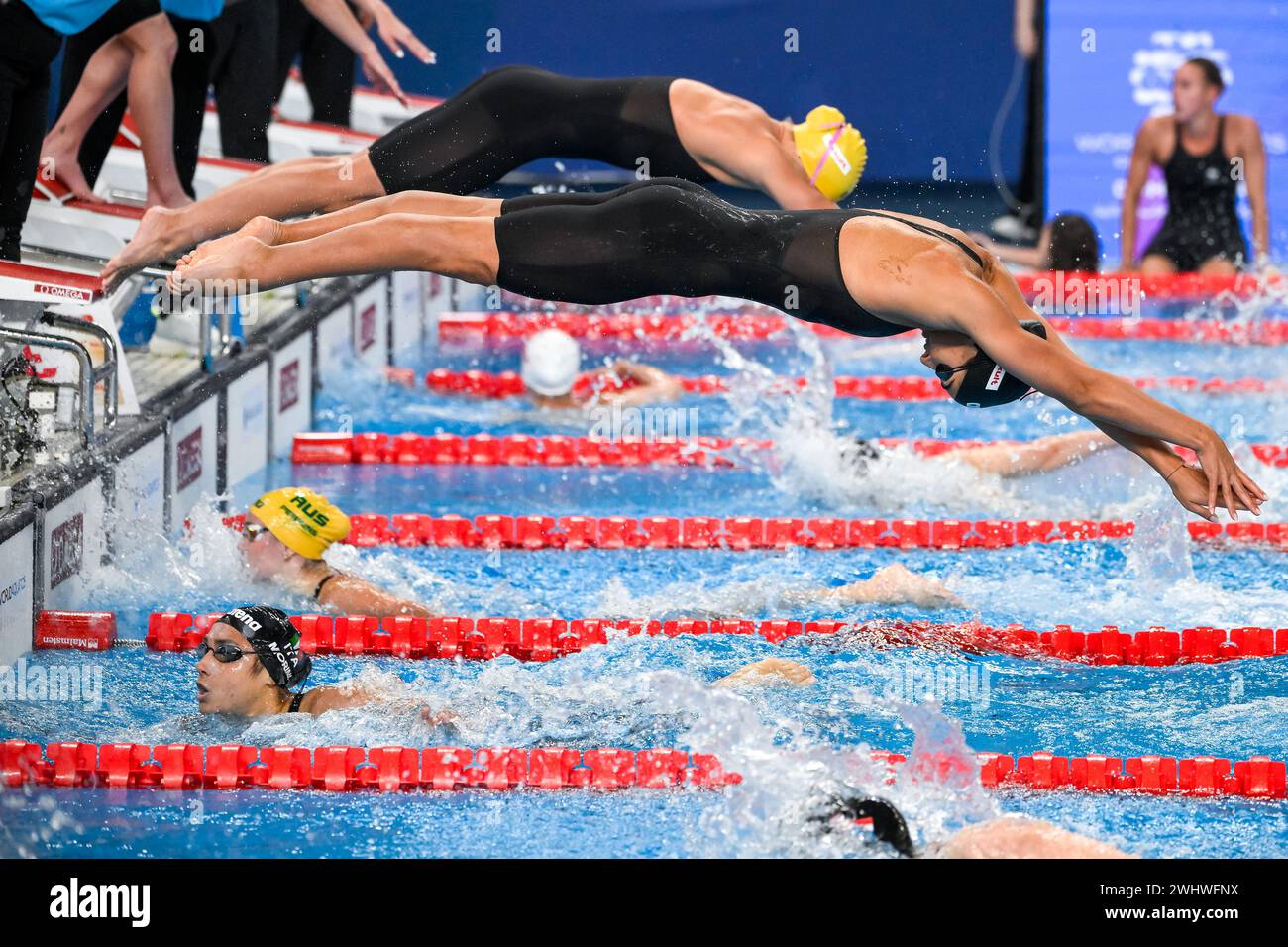 Athletes of team Italy compete in the swimming 4x100m Freestyle Relay ...