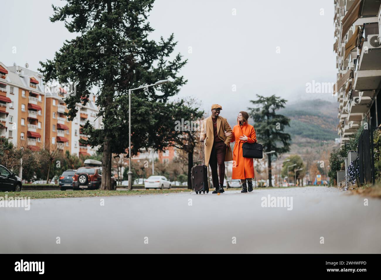 Multiracial people walking together after hi-res stock photography and ...