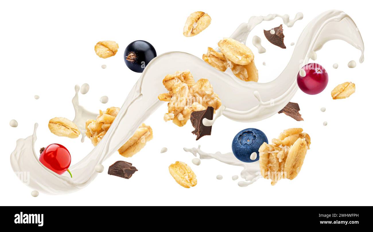 Falling granola with milk splash isolated on white background Stock ...