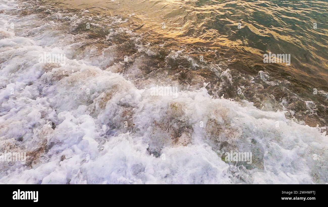 Coastline background ocean waves water foam splash Stock Photo - Alamy