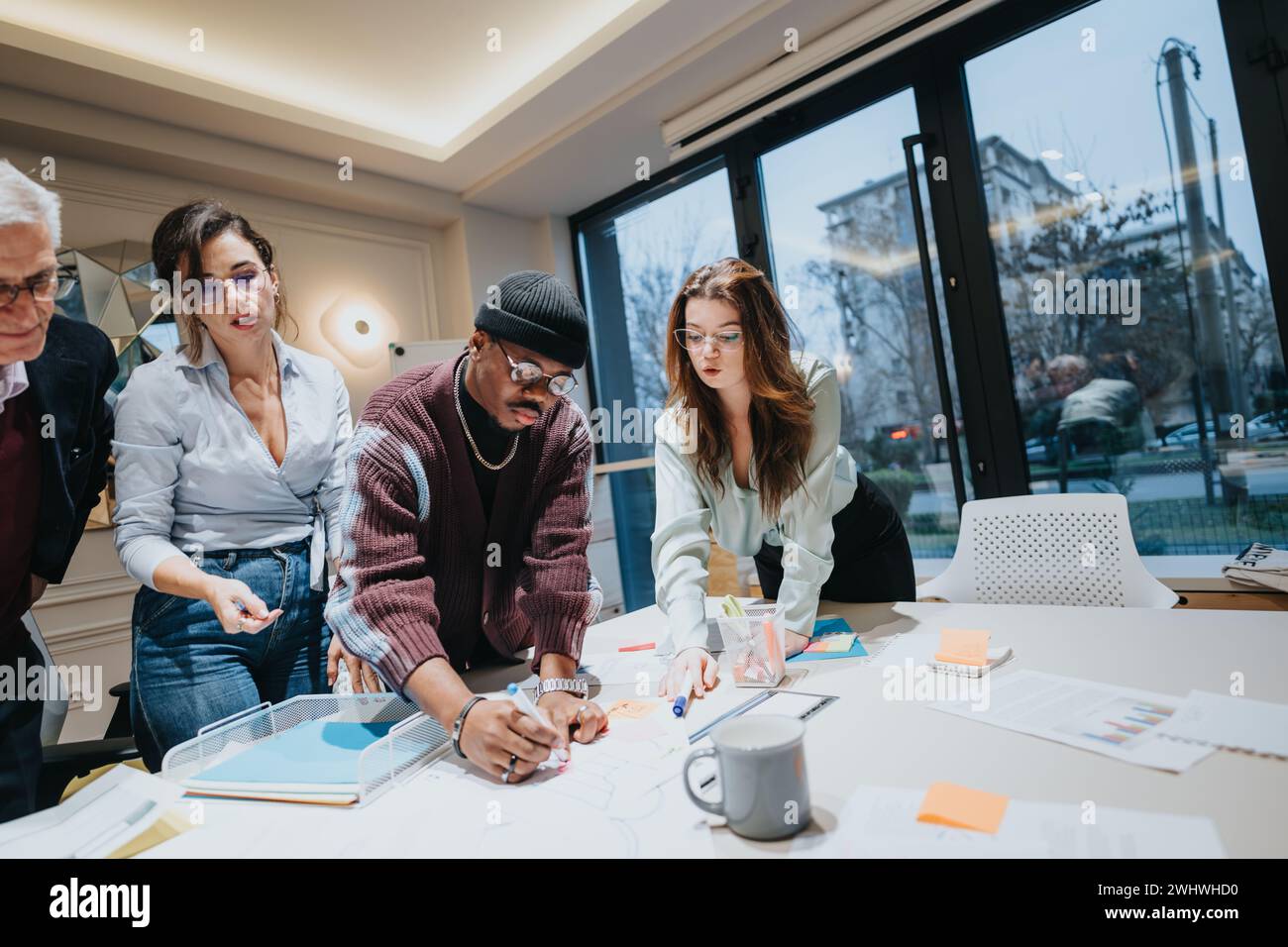 Multigenerational workplace hi-res stock photography and images - Alamy