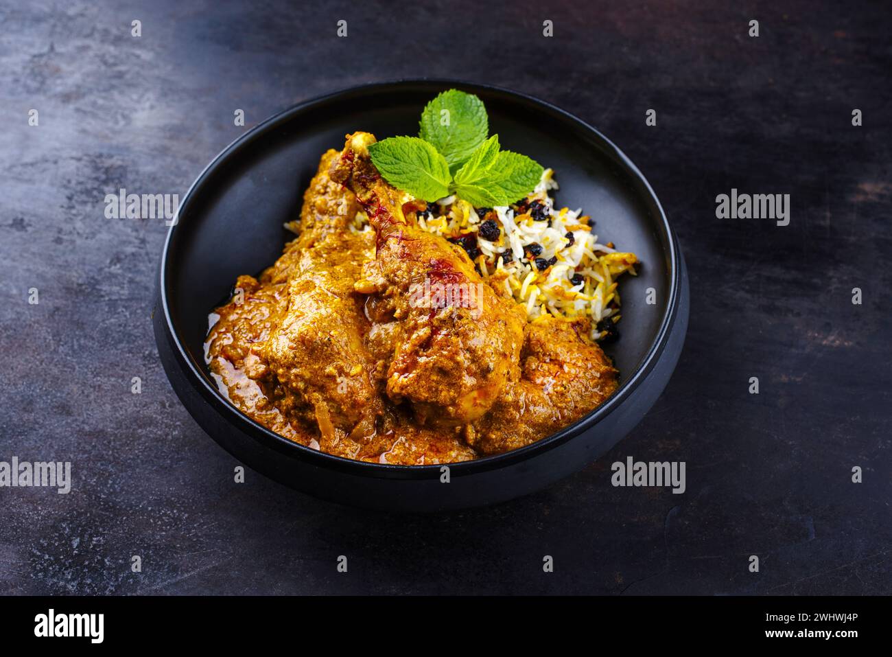 Chicken saffron curry bangladesh hi-res stock photography and images ...