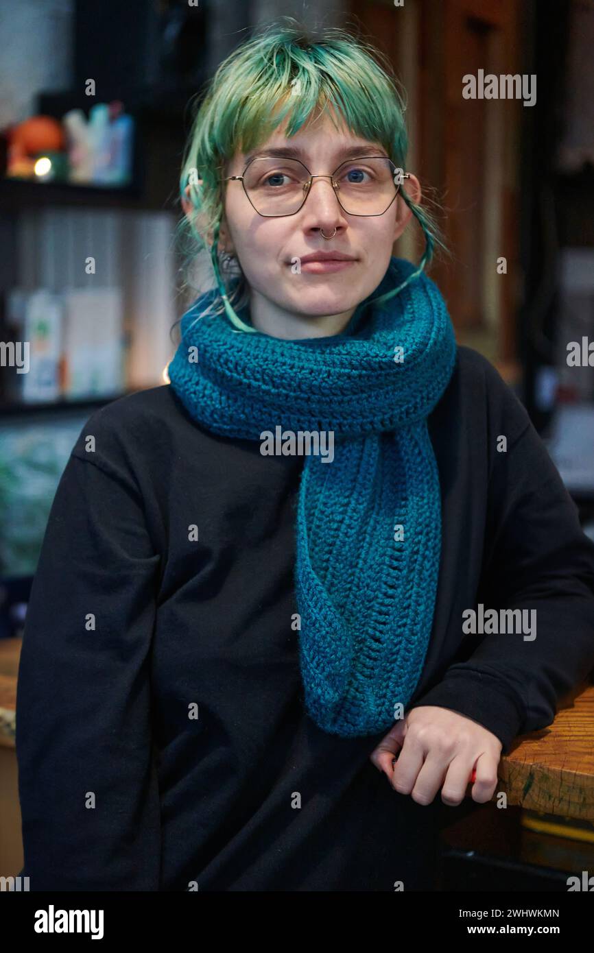A Modern And Intriguing Girl With Striking Blue Hair Enjoys A Night Out