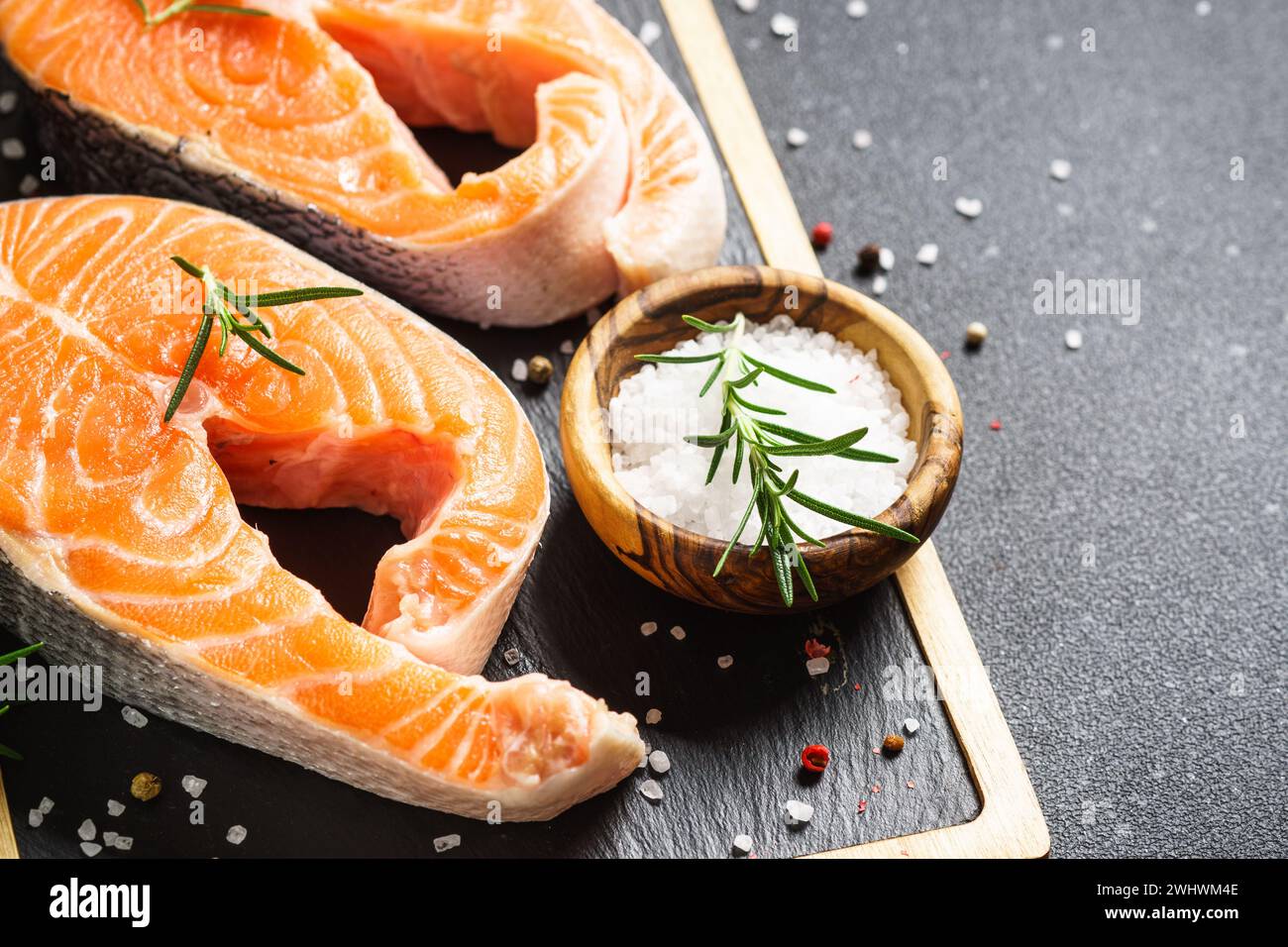 Salmon fish fresh salmon steak on black table Stock Photo - Alamy