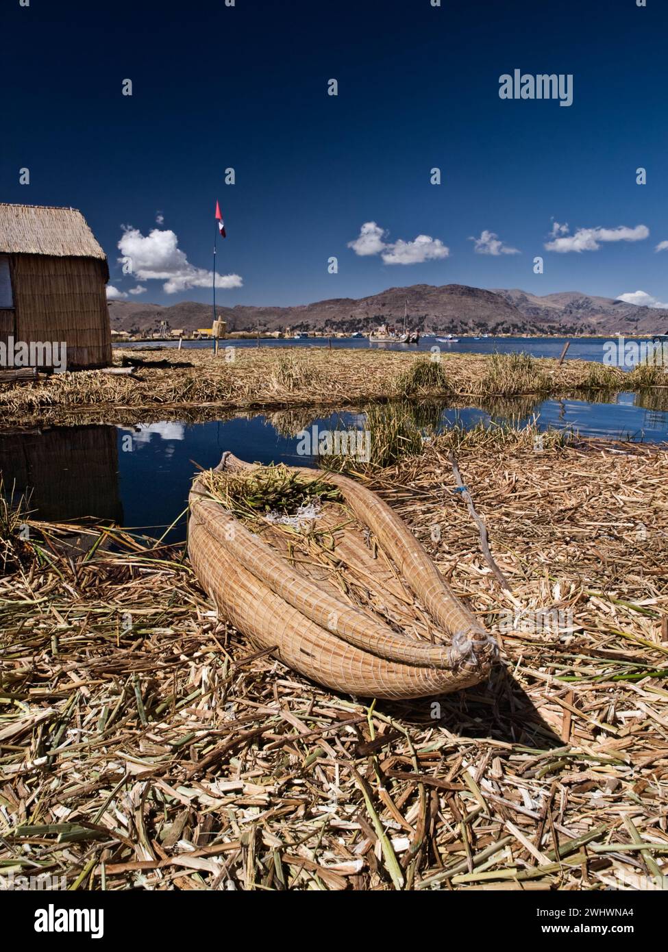 Handmade totora reed boat on the Uros Islands in Lake Titicaca, Puno ...