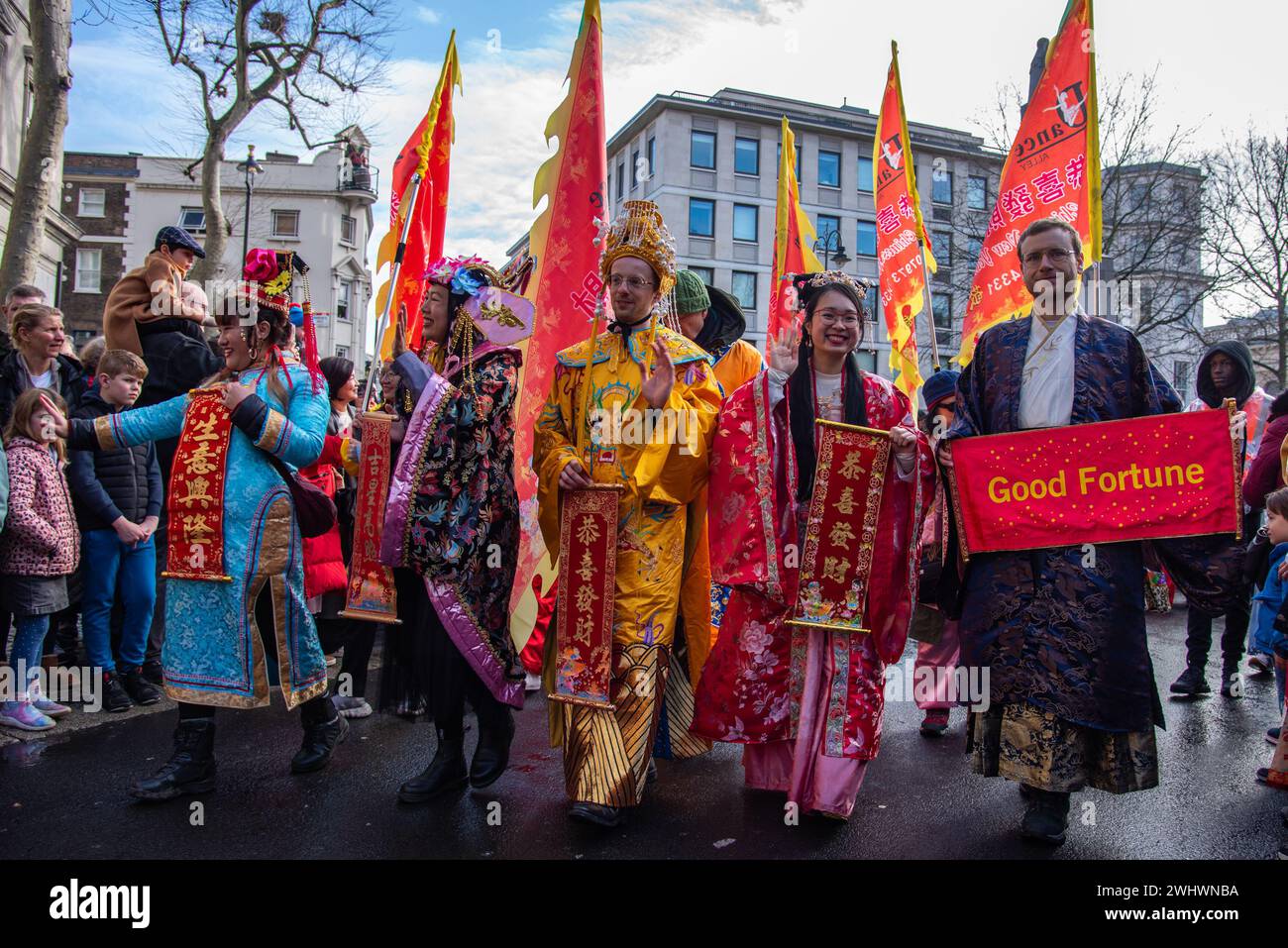 Performers in costume entertain spectators during the Chinese New Year ...