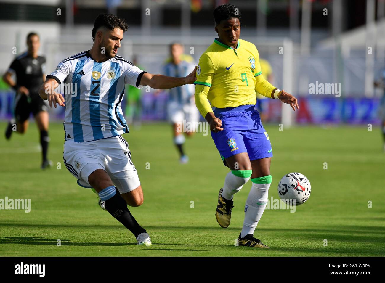 Argentina's Marco Di Cesare, left, and Brazil's Endrick fight for the ball during South America ...