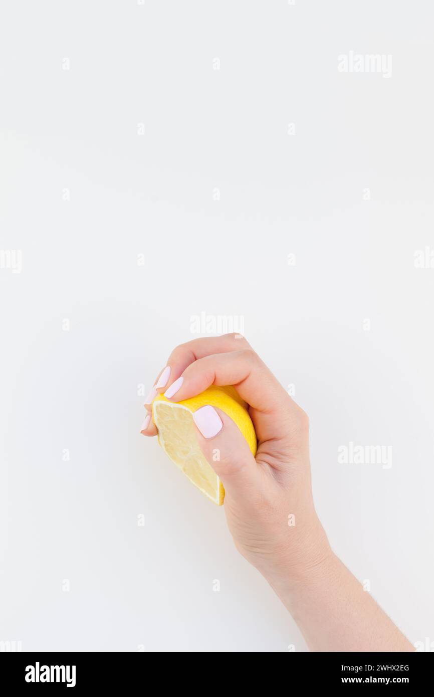 Lemon hand press hi-res stock photography and images - Alamy