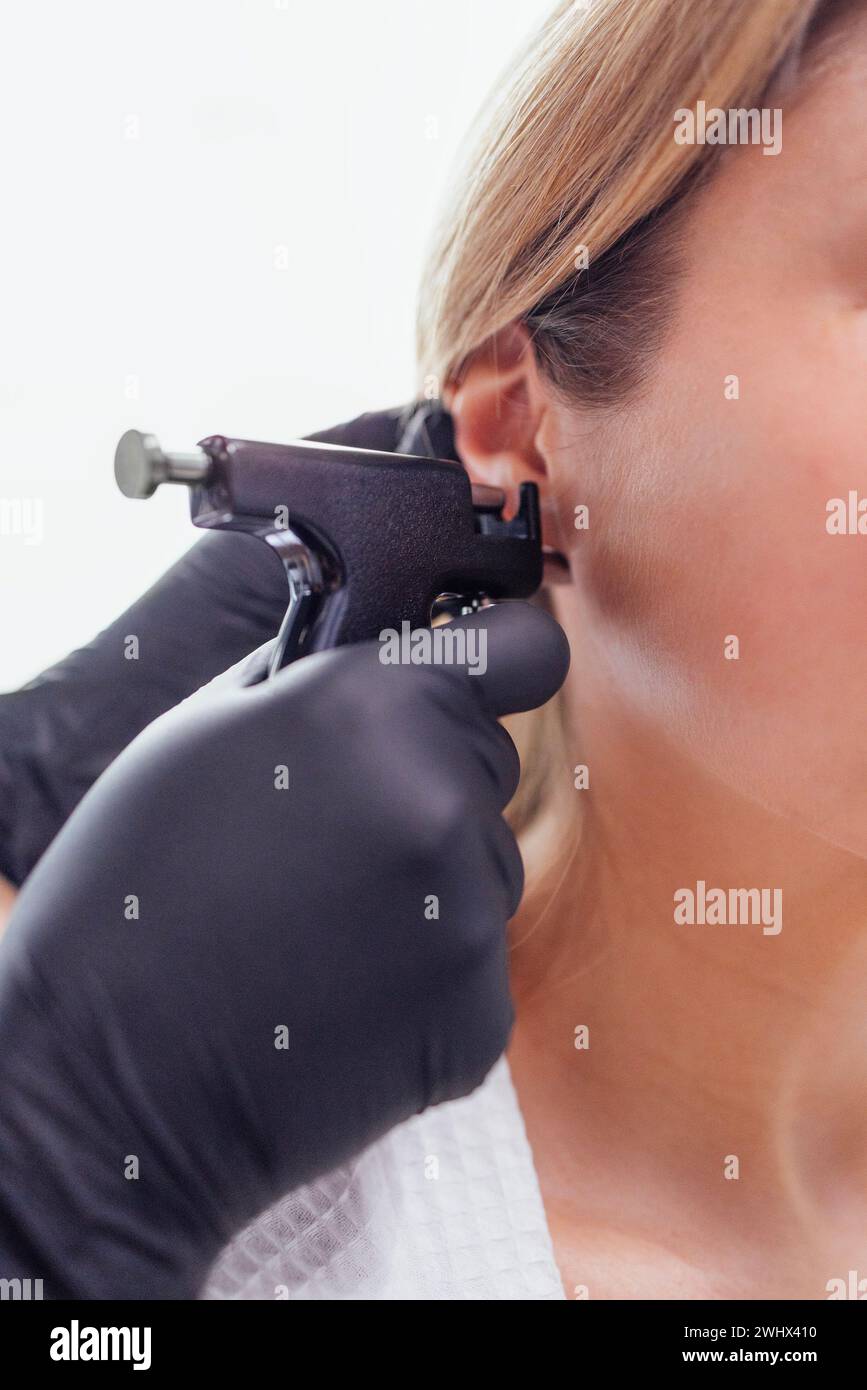 Hold ear hi-res stock photography and images - Alamy