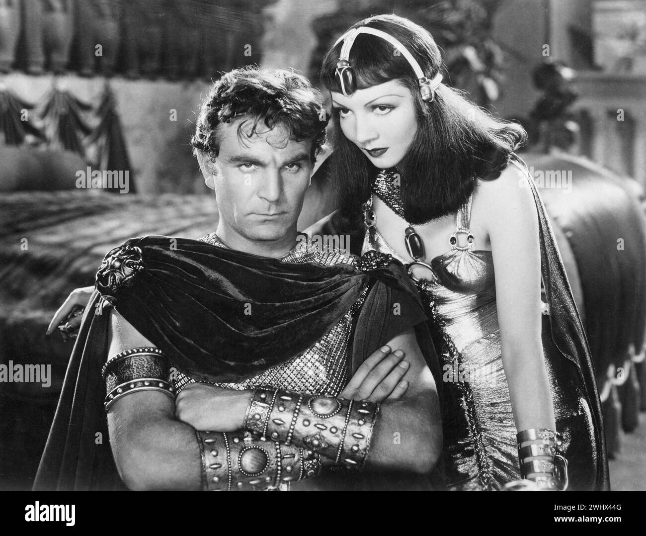 HENRY WILCOXON as Marc Antony and CLAUDETTE COLBERT as Cleopatra in a scene from CLEOPATRA 1934 ...