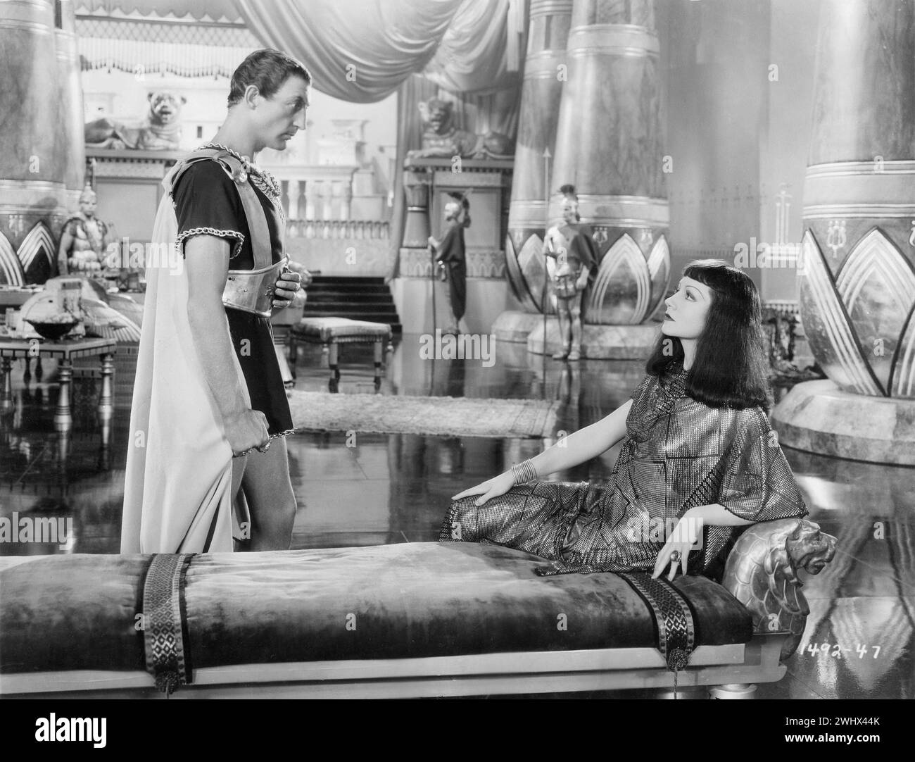 WARREN WILLIAM as Julius Caesar and CLAUDETTE COLBERT as Cleopatra in a scene from CLEOPATRA ...