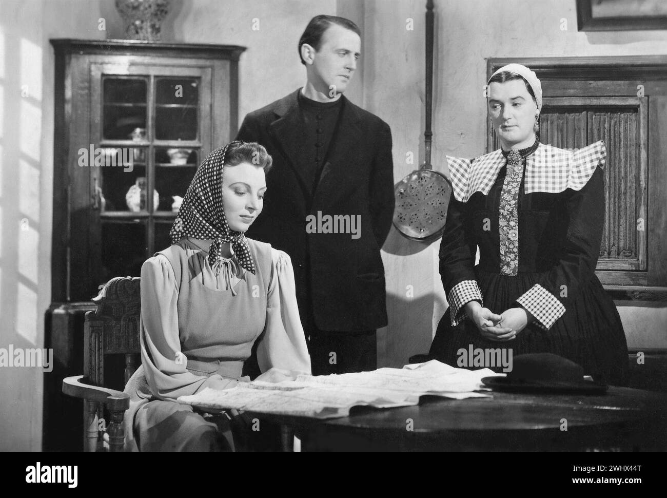 PAMELA BROWN, HUGH BURDEN and HUGH WILLIAMS in a scene from ONE OF OUR ...