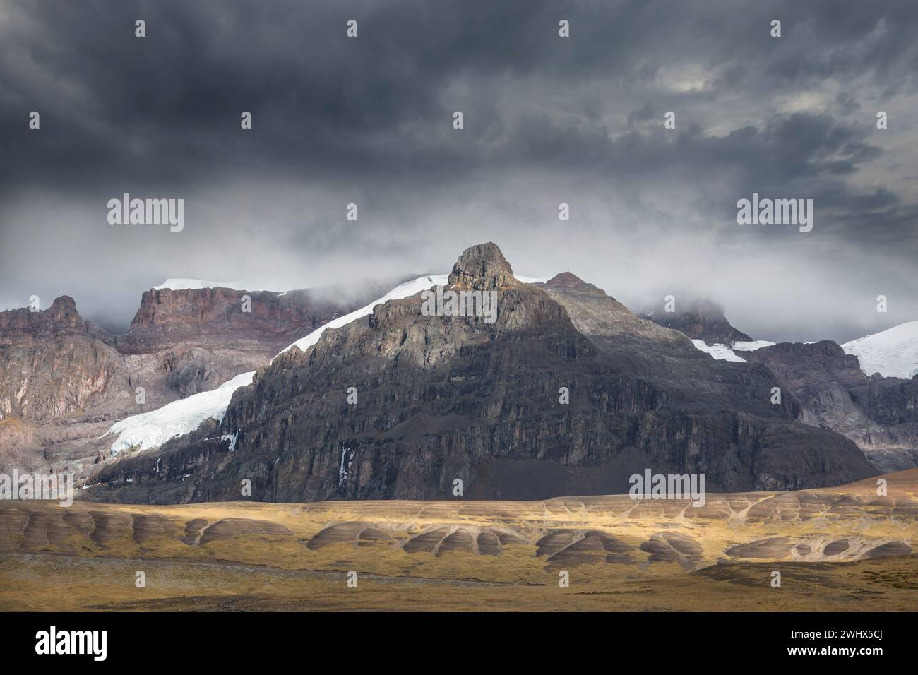 Hiking in the fantastic landscape of the Peruvian high mountain Andes ...