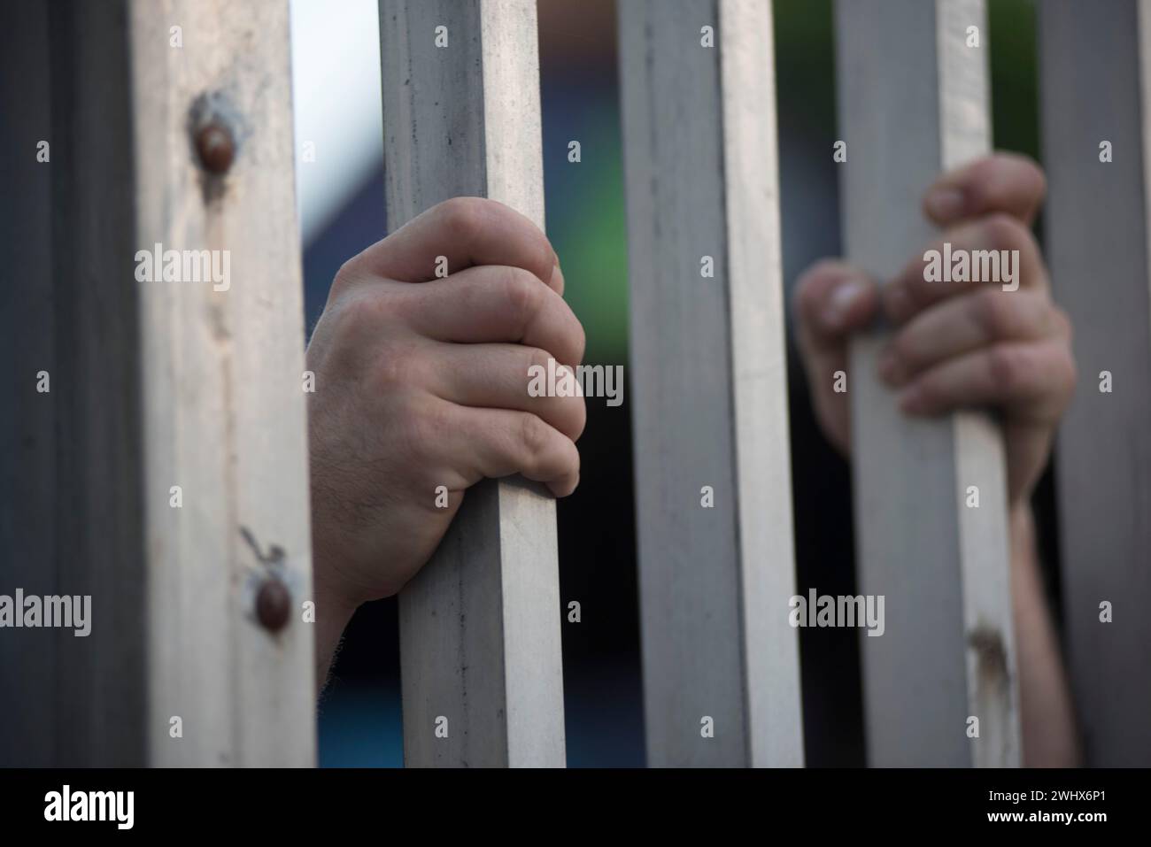Prisoner at the window of a prison cell Stock Photo - Alamy