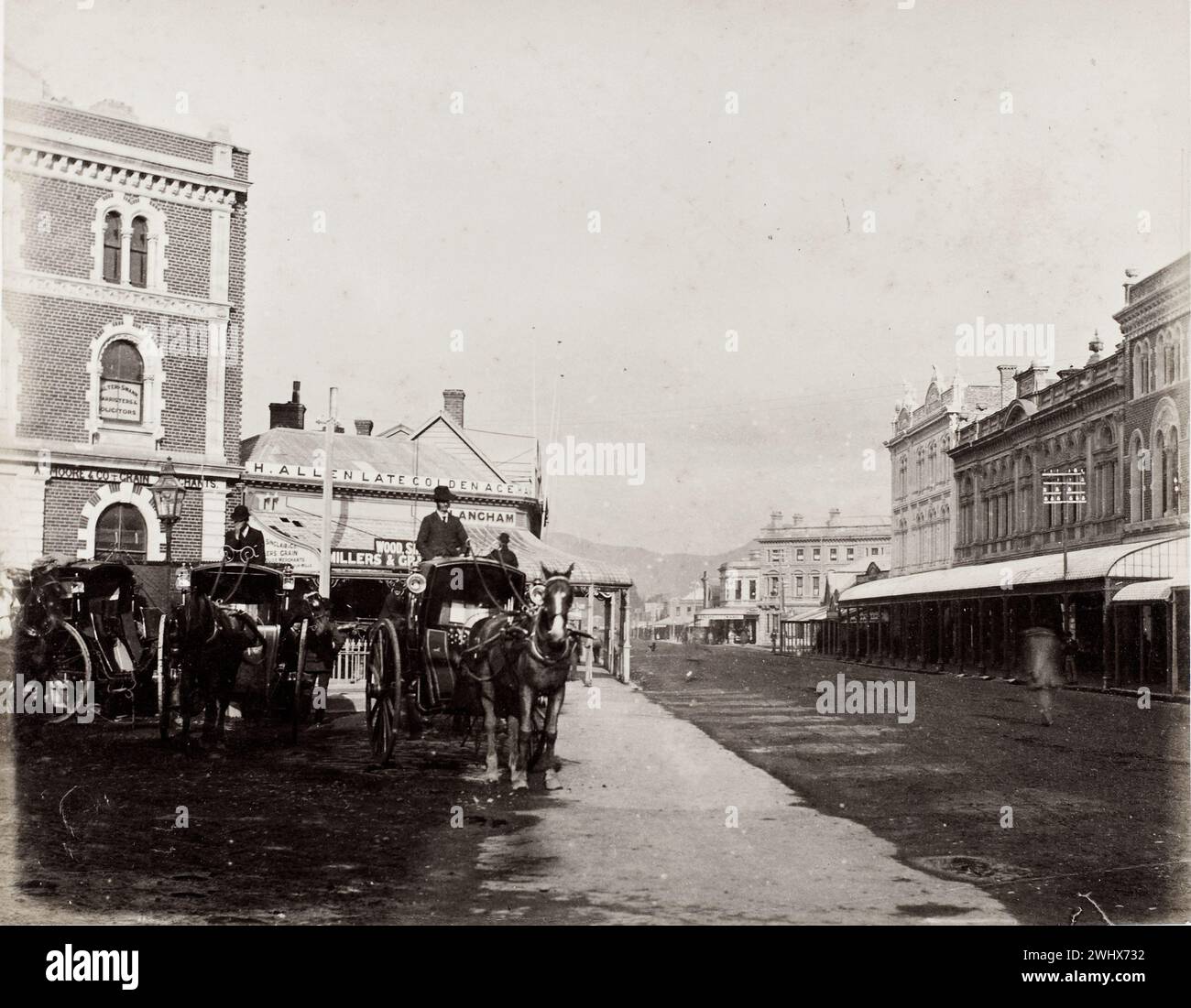 Vintage street photographic scene from New Zealand, early 1900s. Street ...