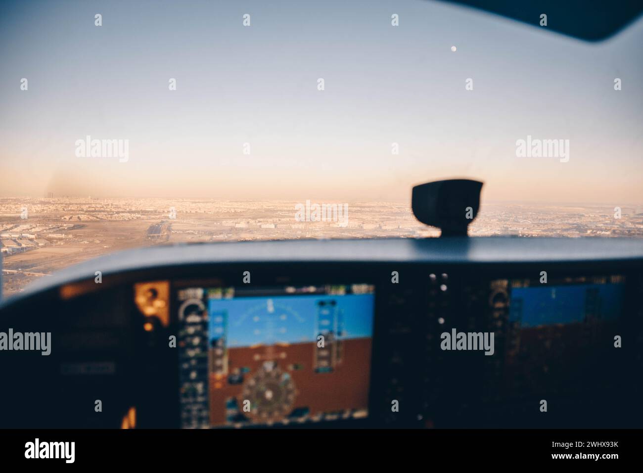 Cockpit of a small plane landing on the airport runway at sunset Stock ...