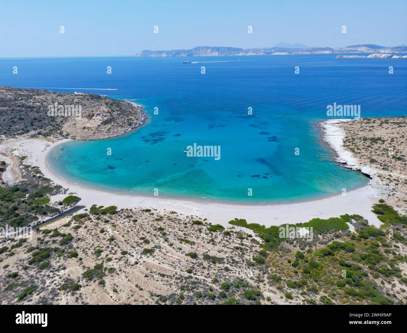 An aerial of the Ano Mersini Beach in Polyaigos, Cyclades, Aegean Sea ...