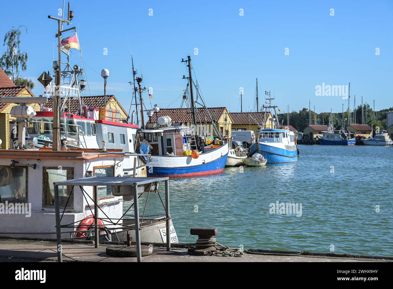 Boats in the fishing port of Freest at the mouth of the Peene River and ...