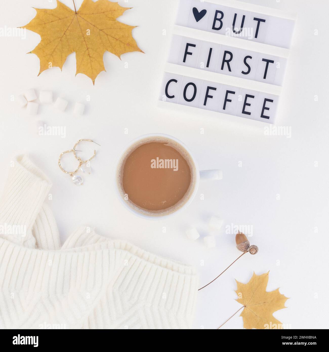But first coffee text on lightbox with Coffee Cup Stock Photo - Alamy