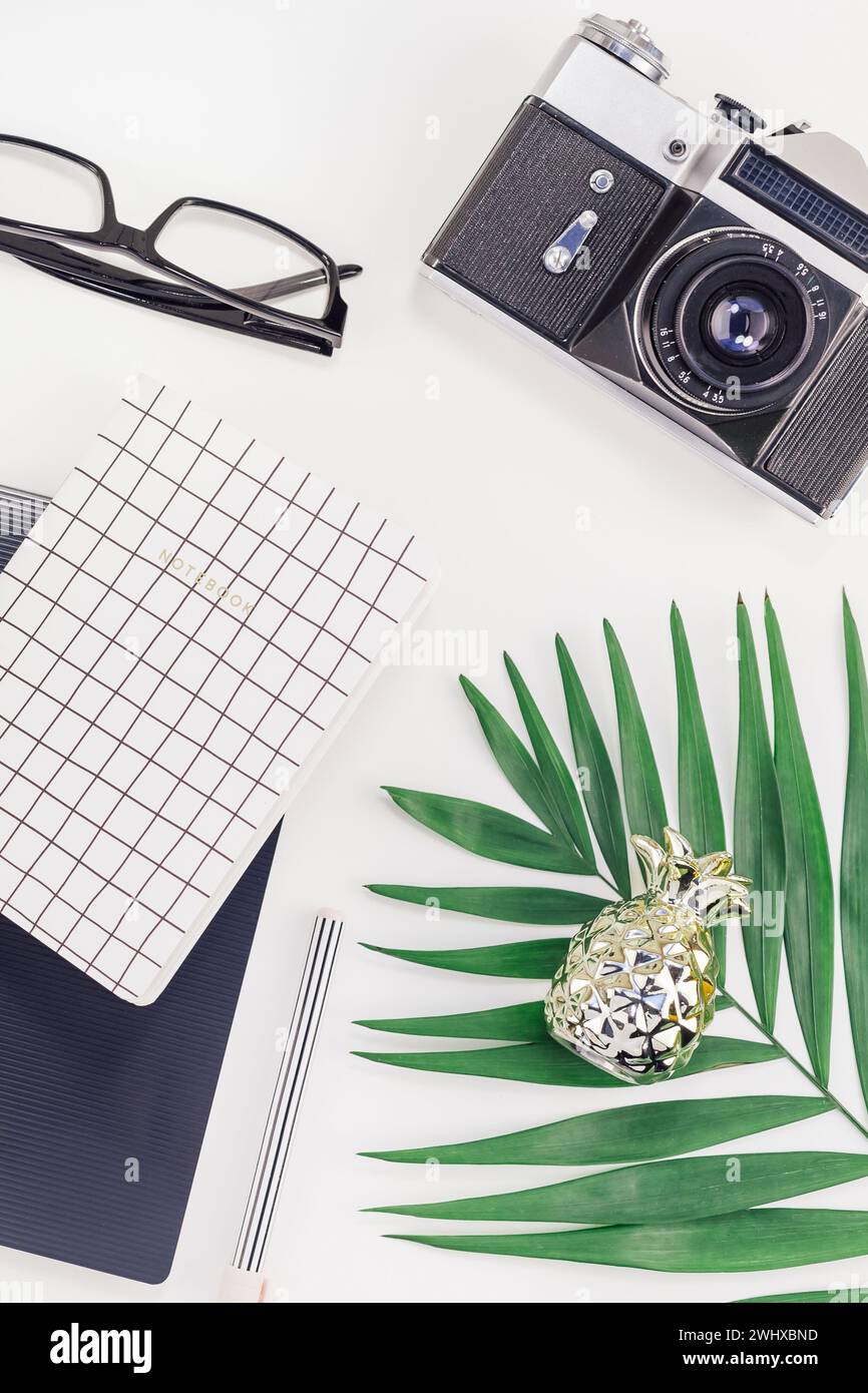 Styled design office workspace desk with camera Stock Photo - Alamy