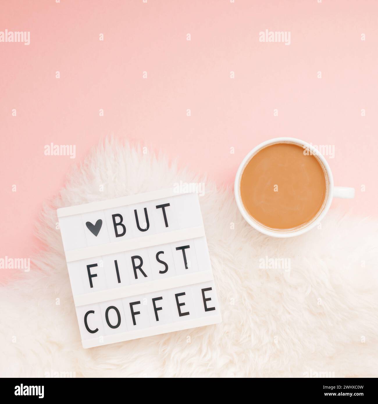 But first coffee text on lightbox with Coffee Cup Stock Photo - Alamy