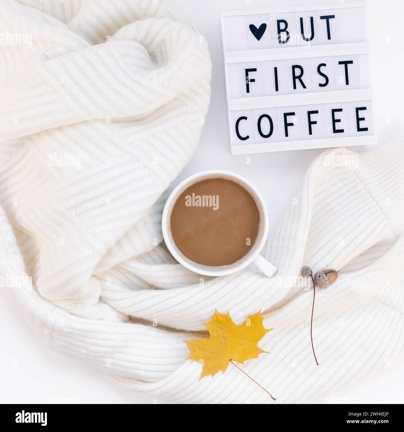 But first coffee text on lightbox with Coffee Cup Stock Photo - Alamy