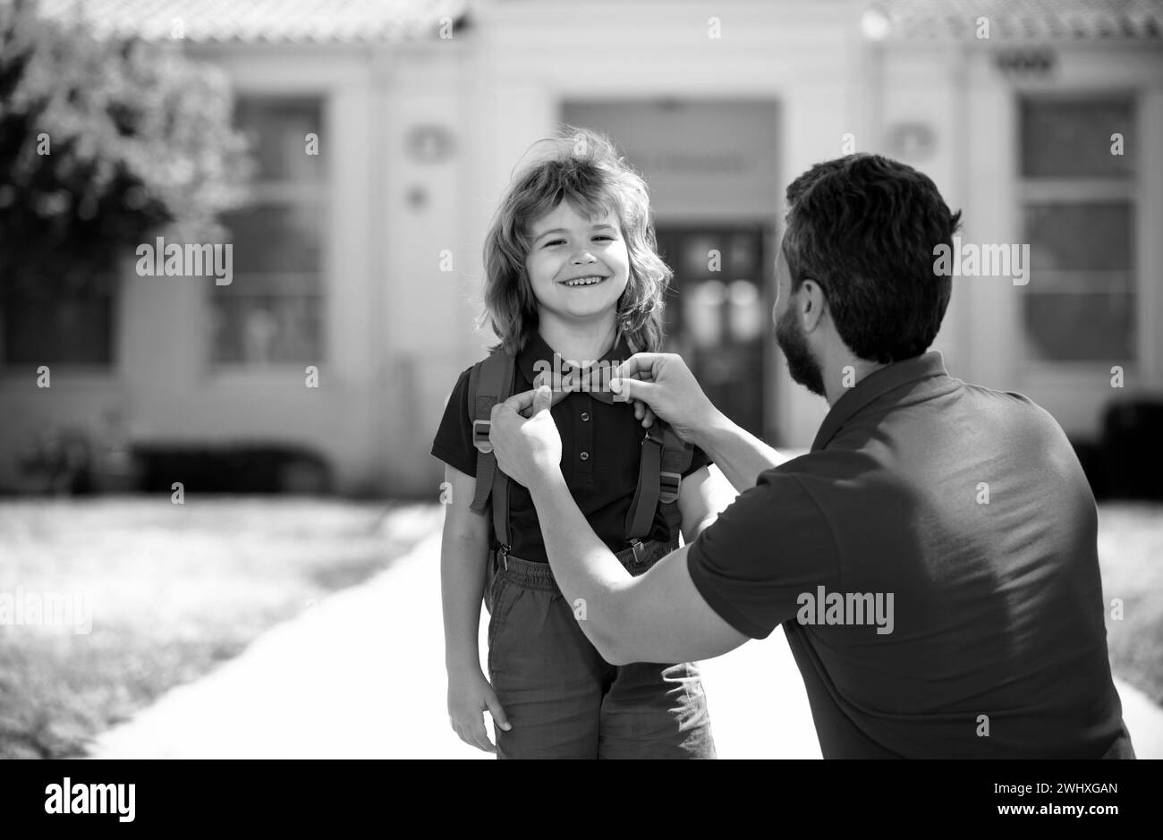 Happy school boy going to school with father. Smart child. Adorable ...