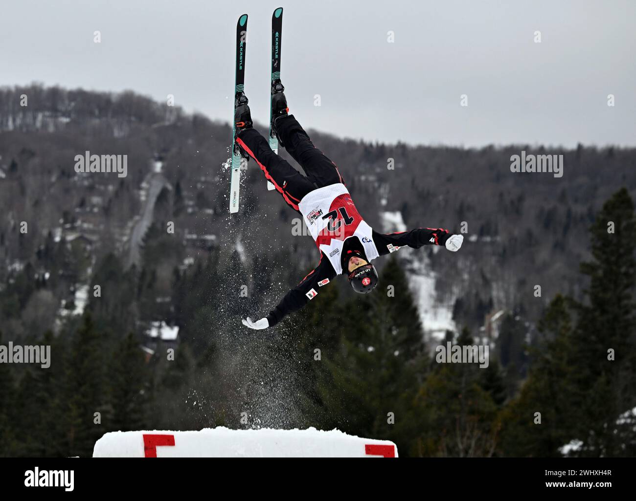Lac Beauport, Canada. 11th Feb, 2024. Lewis Irving of Quebec City jumps ...