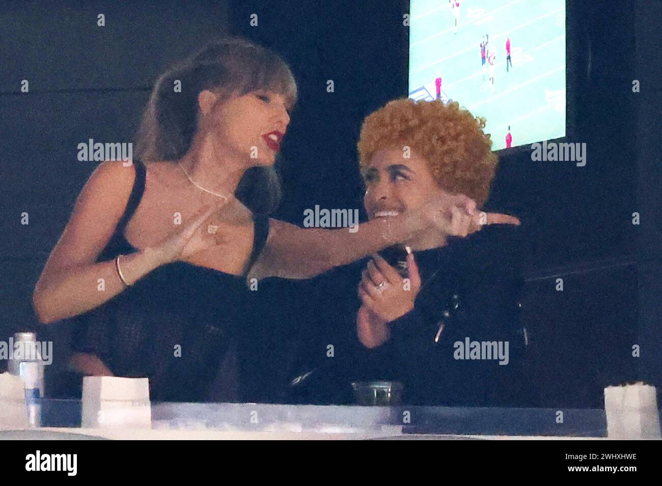 Las Vegas, United States. 11th Feb, 2024. Taylor Swift (C) and rapper ...