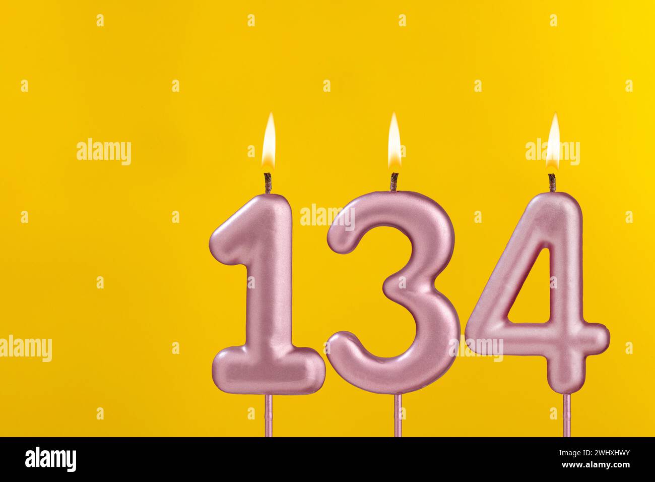 Candle 134 with flame - Birthday card on yellow luxury background Stock ...