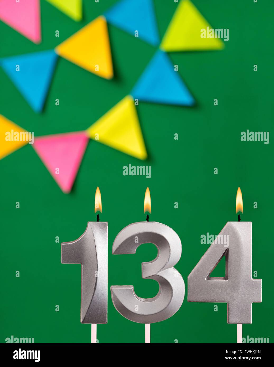 Candle number 134 birthday - Green anniversary card with pennants Stock ...