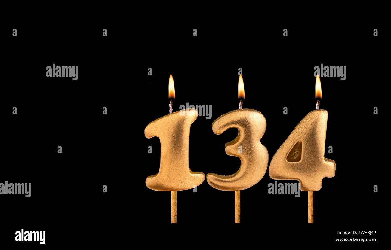 Birthday candle number 134 - Birthday celebration on black background ...
