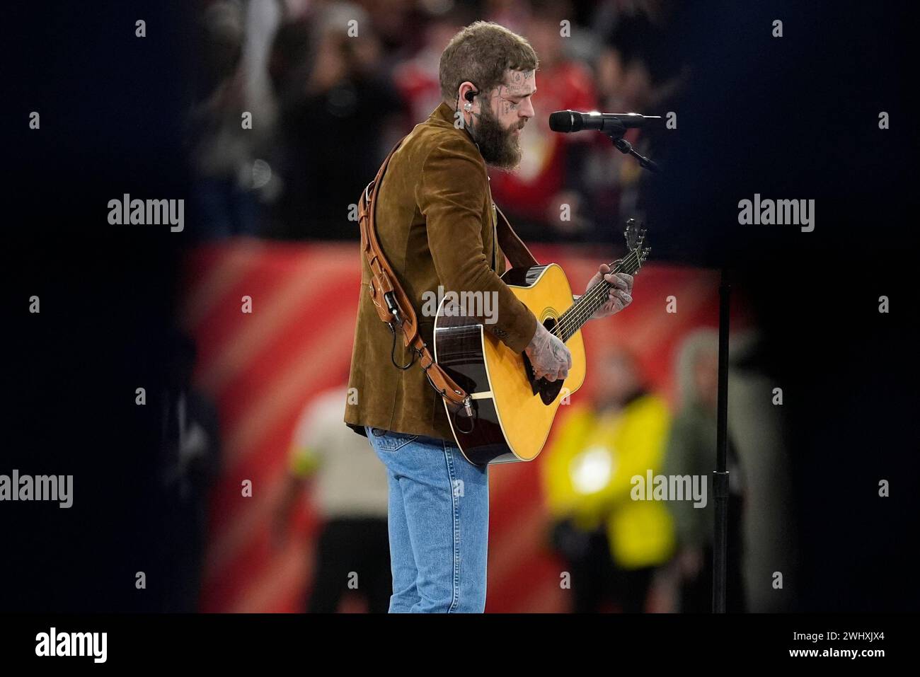 Post Malone performs "America The Beautiful" before the NFL Super Bowl ...