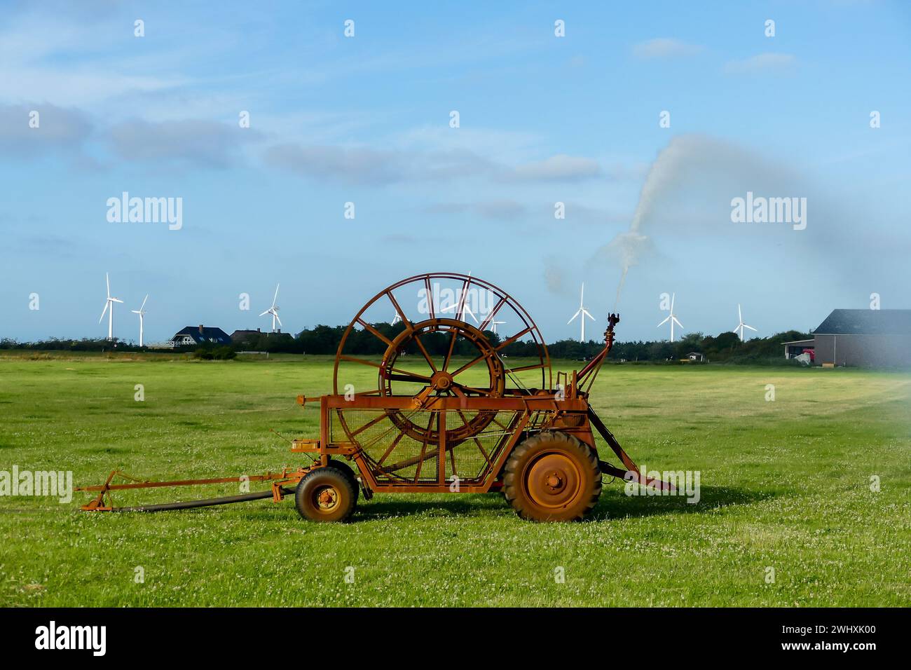 Tractor in field, in Sweden Scandinavia North Europe Stock Photo - Alamy