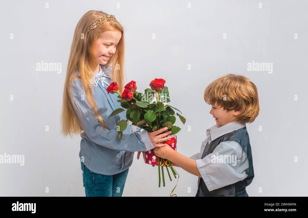 Little Boy with a rose for his teen girlfriend, romantic children ...